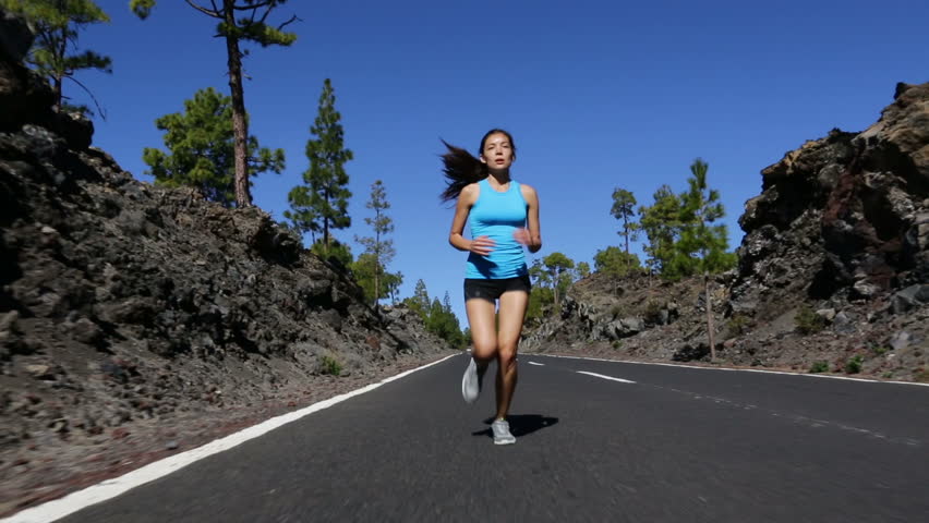 Running Man. Male Runner Training With Determination Outdoors On Road ...